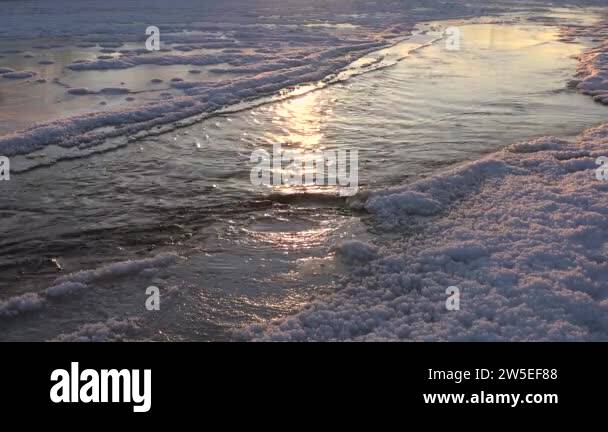 Steam Comes Out of Water and Stream Flowing Under Frozen Ice Sheets in ...