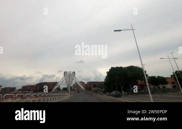 drive across the large arched bridge, known as the Ostiense viaduct ...