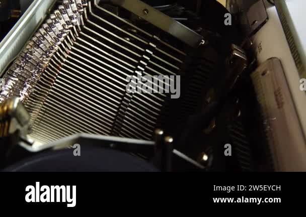 Mechanism of a retro typewriter. Old typewriter hammers. Close up Stock ...