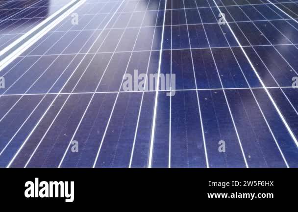 Dolly shot of long solar panels. Concept of green energy and ...