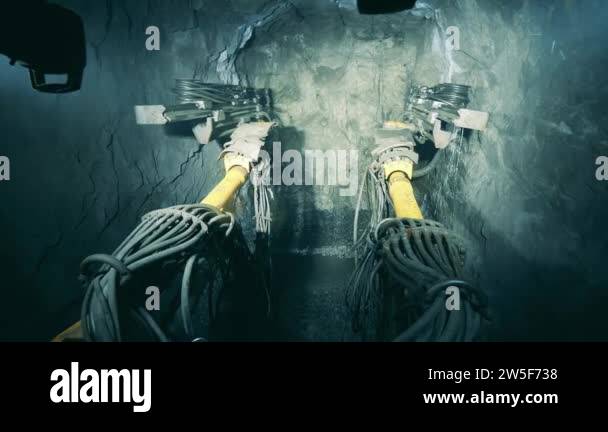 Mine walls are getting processed by a boring machine Stock Video ...