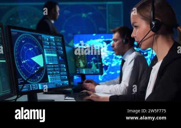 Workplace of the air traffic controllers in the control tower. Team of ...