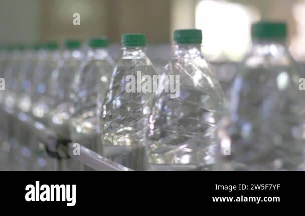 Automatic conveyor line for bottling mineral water in the plastic ...