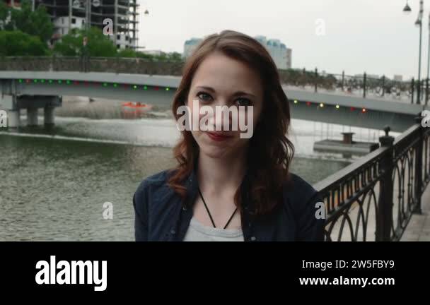 Young teen girl smiling outdoors Stock Video Footage - Alamy