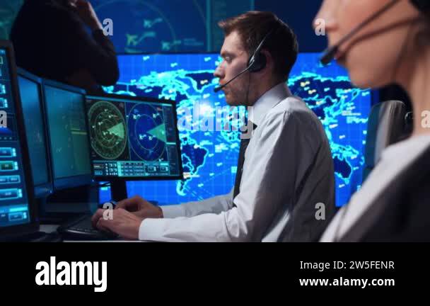 Workplace of the air traffic controllers in the control tower. Team of ...
