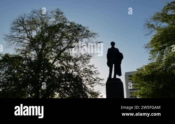 Silhouette the statue of John Robert Godley the founder of Canterbury ...
