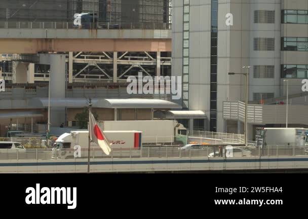 Highways running between buildings in heavily built-up city Stock Video ...