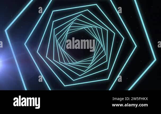 Hexagonal shapes spinning in seamless motion against spot of light on ...