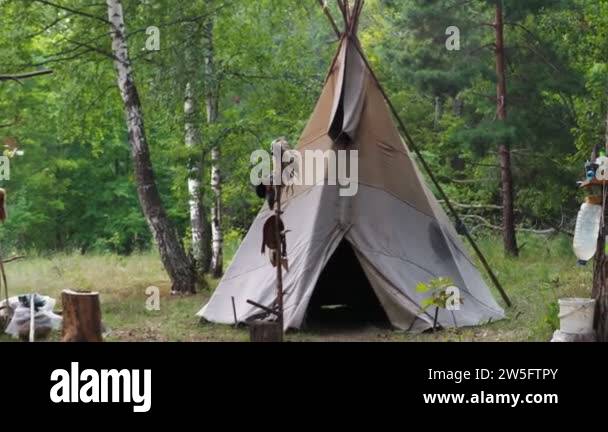 Forest home of the Indians. Wigwam indian teepee. The life of nomadic ...