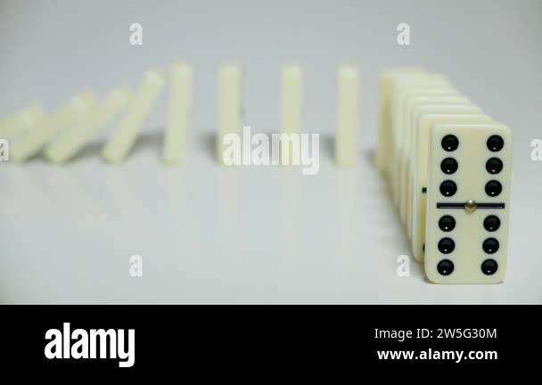 Domino effect chain reaction focus Stock Videos & Footage - HD and 4K ...