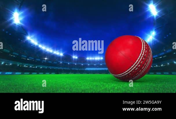 Modern Cricket Stadium with shining lights and ball motion on the grass ...