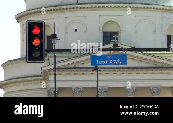A traffic light turns from red to yellow to green in downtown Warsaw ...