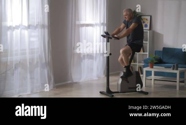 Stationary spinning bike exercise Stock Videos & Footage - HD and 4K ...