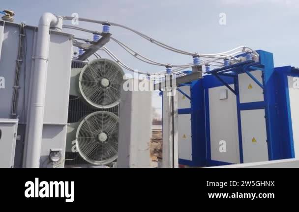 Power transformer with cables at electrical distributing substation on ...