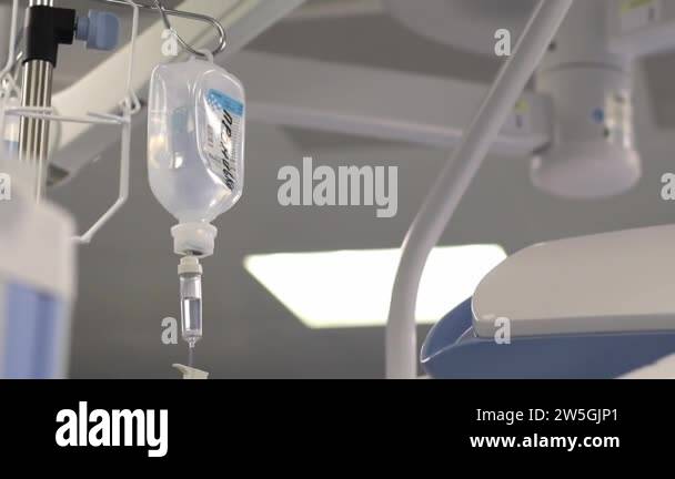 Surgeon doctor operating wearing special lamp lighting using electric ...