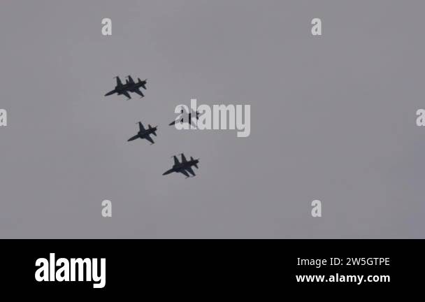 Perfect example of teamwork: a narrow formation of six fighter jets in ...