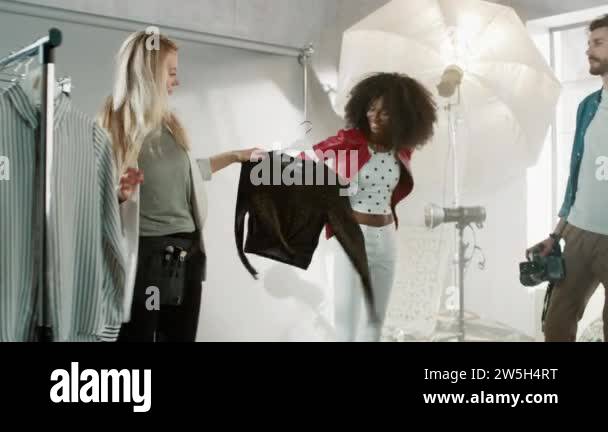 Backstage of the Photo Shoot: Stylist Chooses Outfit and Clothes for a ...