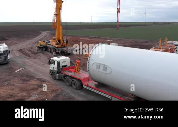 Building process of wind energy power tower, windmill under ...
