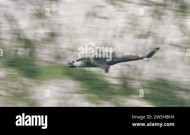 Mil Mi-24 Hind russian gunship and attack helicopter at high speed ...