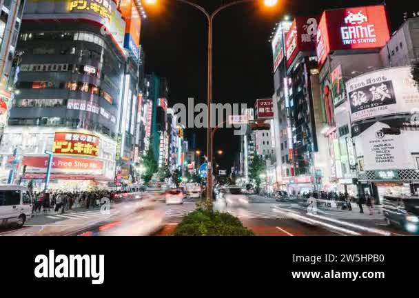 Time-lapse of car traffic transportation, crowded Asian people cross ...