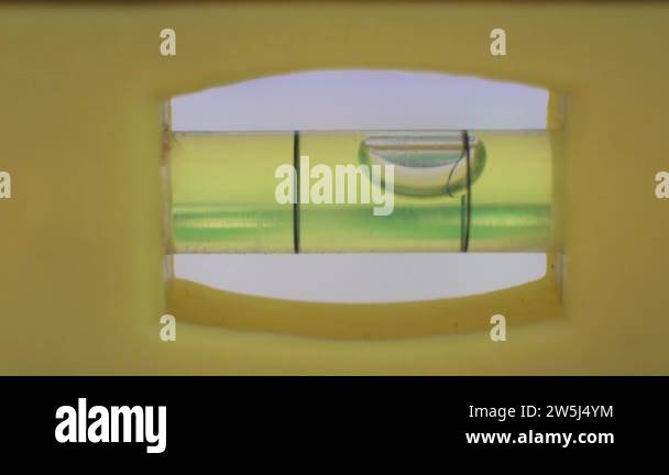 4k resolution close up footage shows the bubble inside the tube of a ...