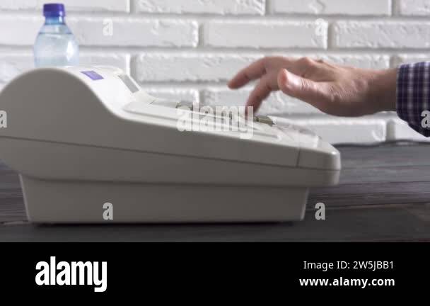 Electronic cash register with buttons and a receipt printer Stock ...