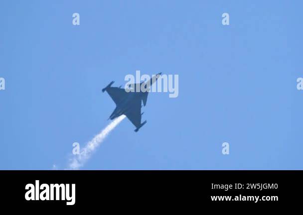 Impressive fire behind the jet engine of a military fighter jet Stock ...