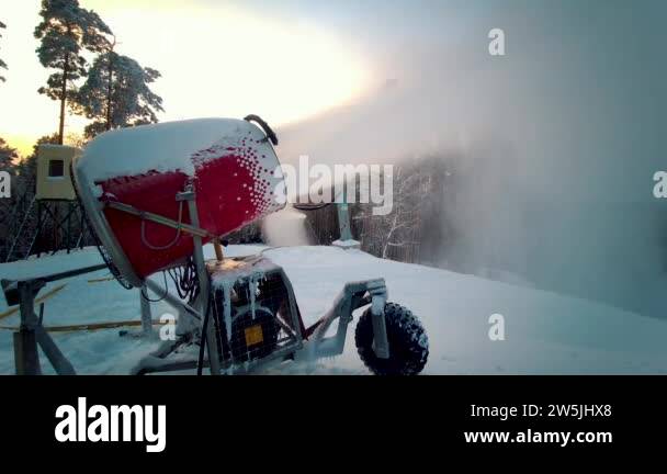 Snow Gun Spraying Artificial Ice Crystals to Ski Piste, Snowmaking in ...