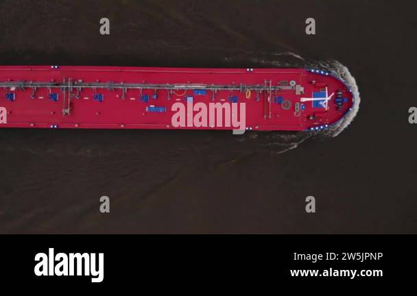 Aerial view oil tanker is floating at river moving for unloading in ...