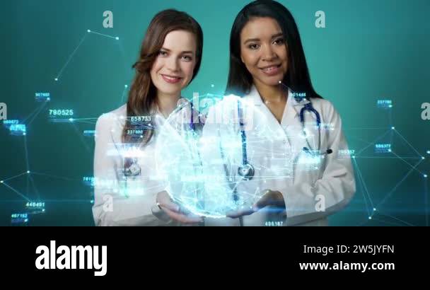 Beautiful Hologram Rotating on Hands of Female Doctors. Young Smiling Women Medics Holding ...