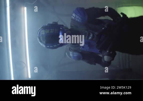 Cyberpunk future. Police officer halfman bionic cyborg stands with ...