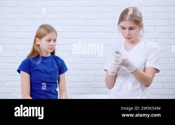Young girl injection Stock Videos & Footage - HD and 4K Video Clips - Alamy