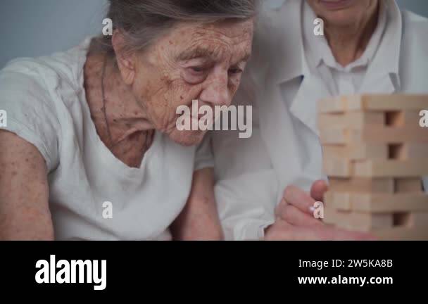 Jenga game. Theme is dementia, aging and games for old people ...