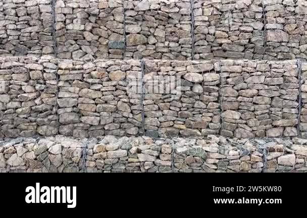 Gabion wall constructed using steel wire mesh basket. Stone walls ...