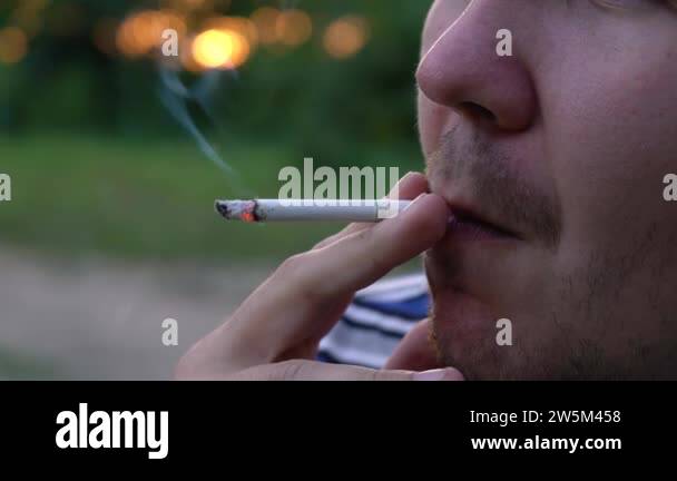 Man smokes cigarette sunset Stock Videos & Footage - HD and 4K Video ...