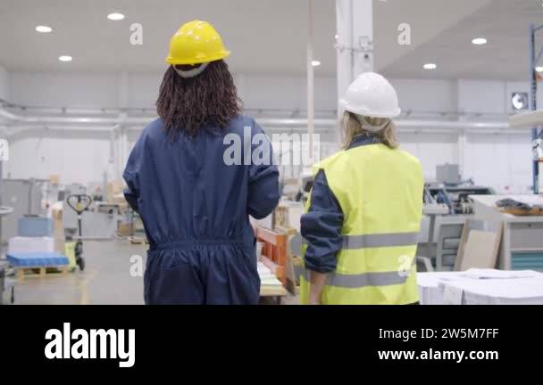 Factory uniforms Stock Videos & Footage - HD and 4K Video Clips - Alamy