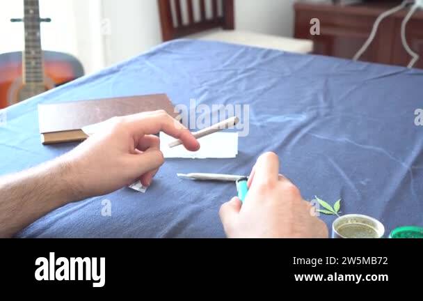 Marijuana joint lit Stock Videos & Footage - HD and 4K Video Clips - Alamy