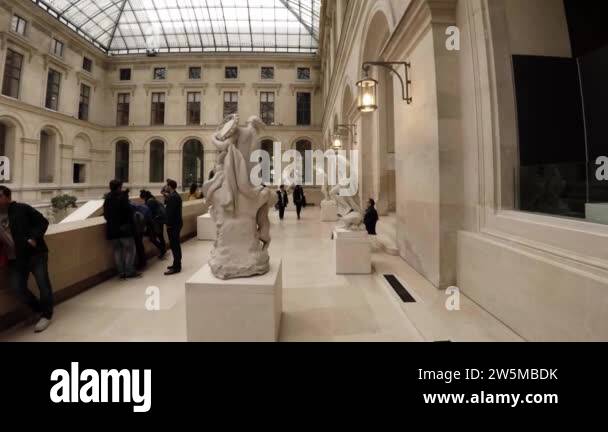 Statues and sculptures in the Louvre museum in Paris. France. Video in ...