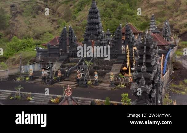 Ascending pedestal aerial view of stunning black stone pillars and ...