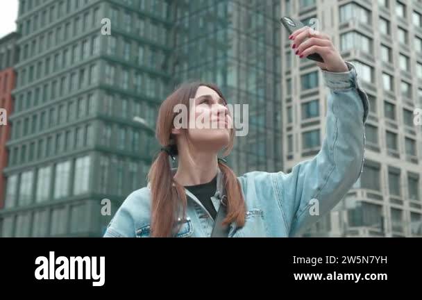 young woman stand in outdoor feels annoyed having problems with ...