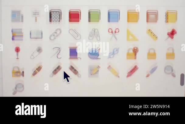 Faceless user choosing smiley heart from emoticon collection on pc ...