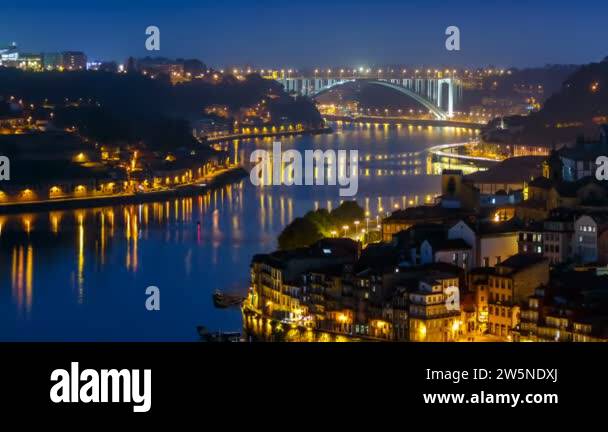 City of Porto and Gaia at night by the Douro river timelapse in ...