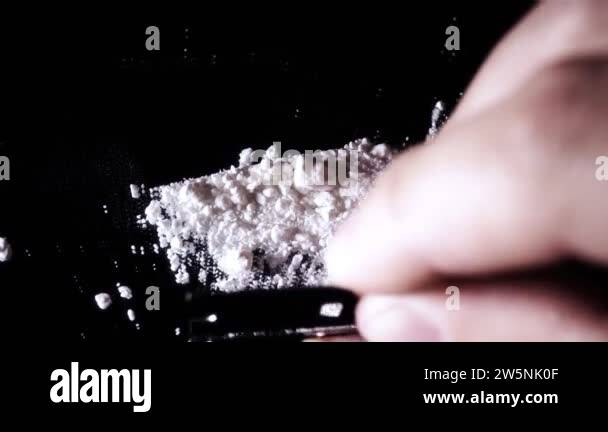 Cutting cocaine Stock Videos & Footage - HD and 4K Video Clips - Alamy