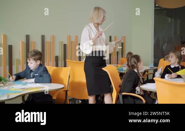 Teacher singing in classroom Stock Videos & Footage - HD and 4K Video ...
