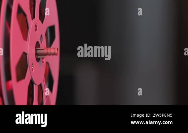 The camera moves to professional analog reel-to-reel audio magnetic ...