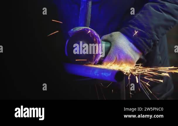 Professional Male Worker Works in Production with Metal. Man Uses ...