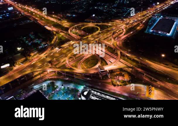 Time-lapse of car traffic transport on multiple lane highway or winding ...