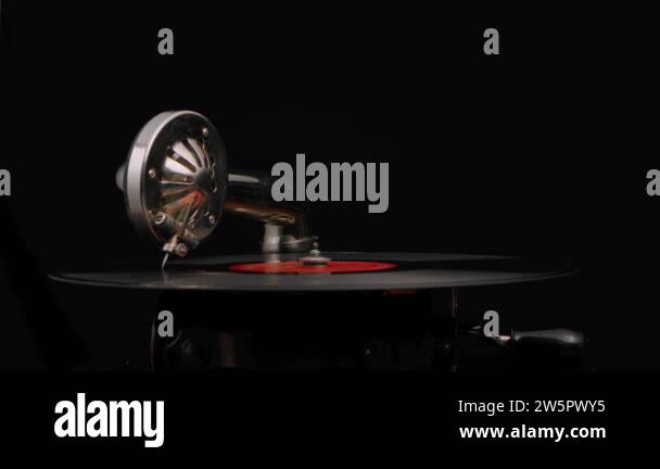 Vintage old record player gramophone needle on vinyl record. Wooden ...