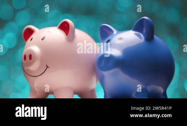 project video showing two piggy banks in front of blue lights ...