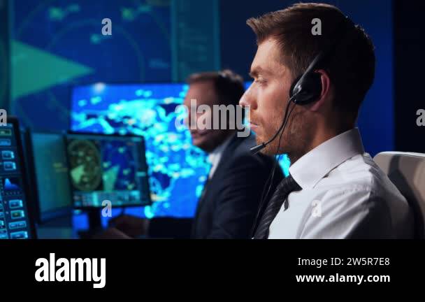 Workplace of the air traffic controllers in the control tower. Team of ...